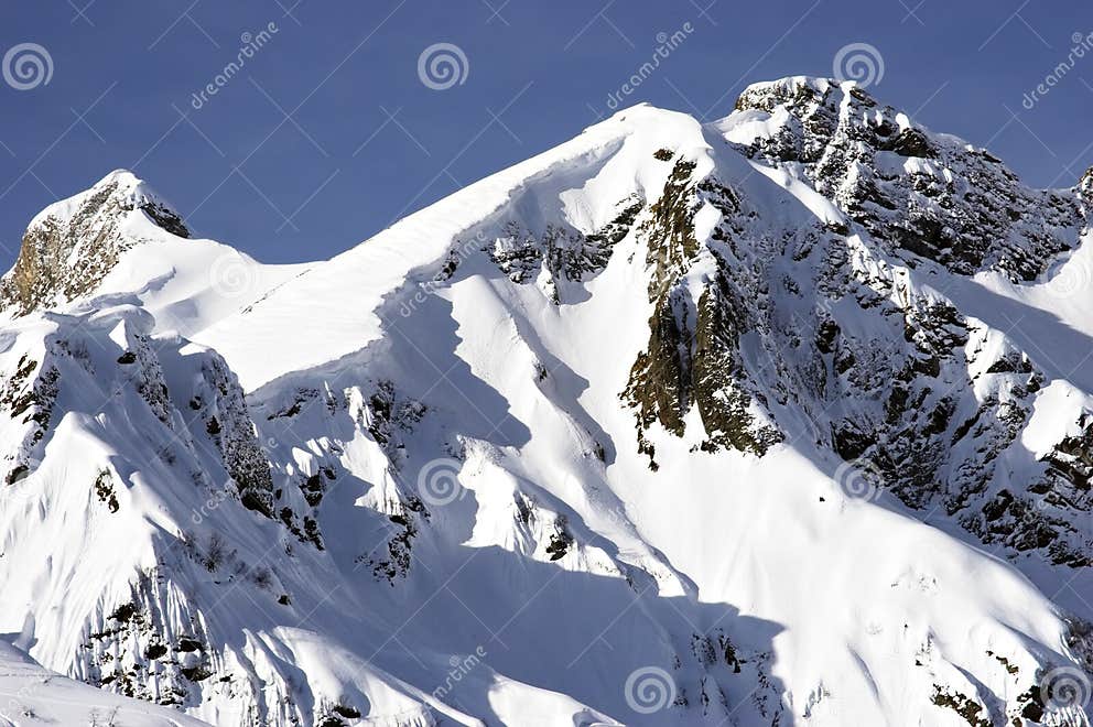 Snow mountains stock photo. Image of peaks, slopes, alps - 1453168