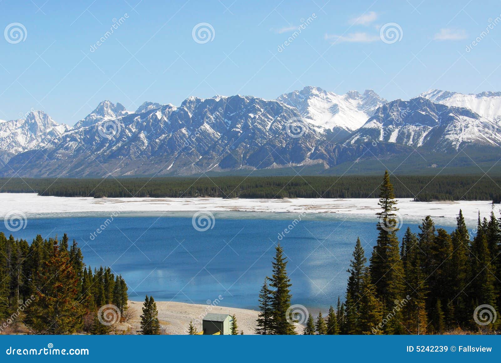 Snow mountains and lake stock image. Image of cliff, lakeside - 5242239