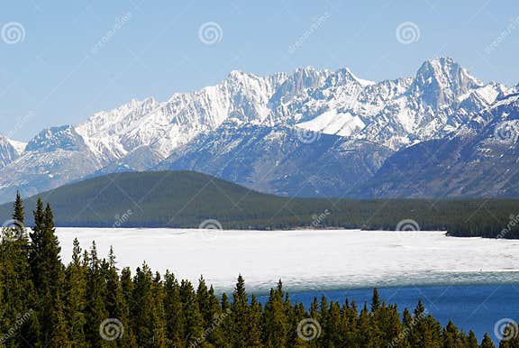 Snow mountains and lake stock image. Image of peak, season - 5249277