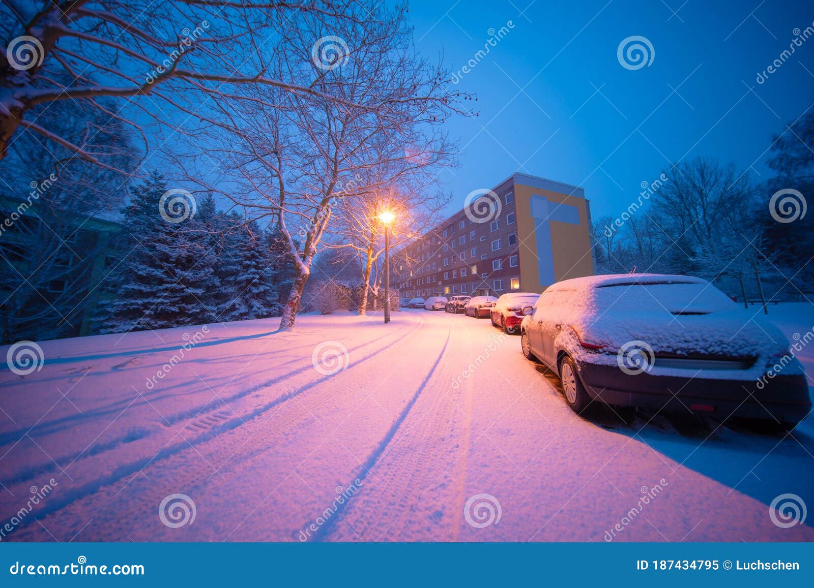 Snow in the night city stock image. Image of dark, windows - 187434795