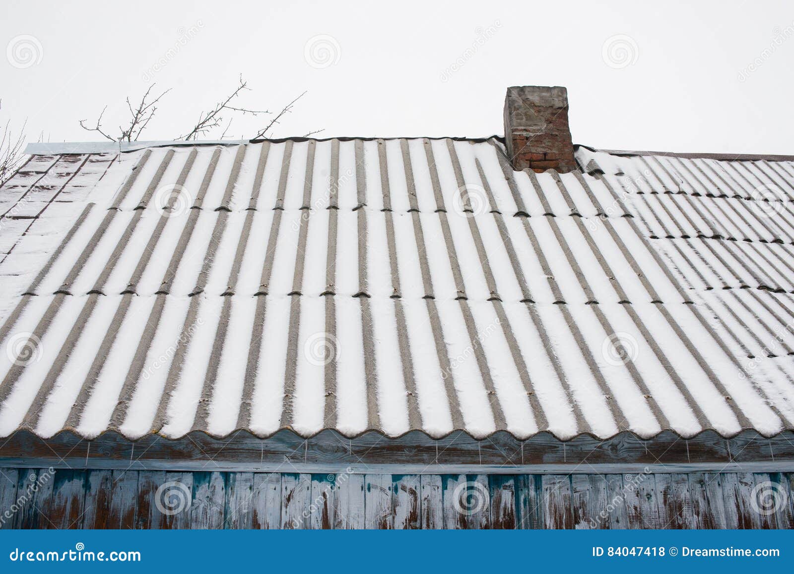 Snow on old slate roof stock photo. Image of material - 84047418