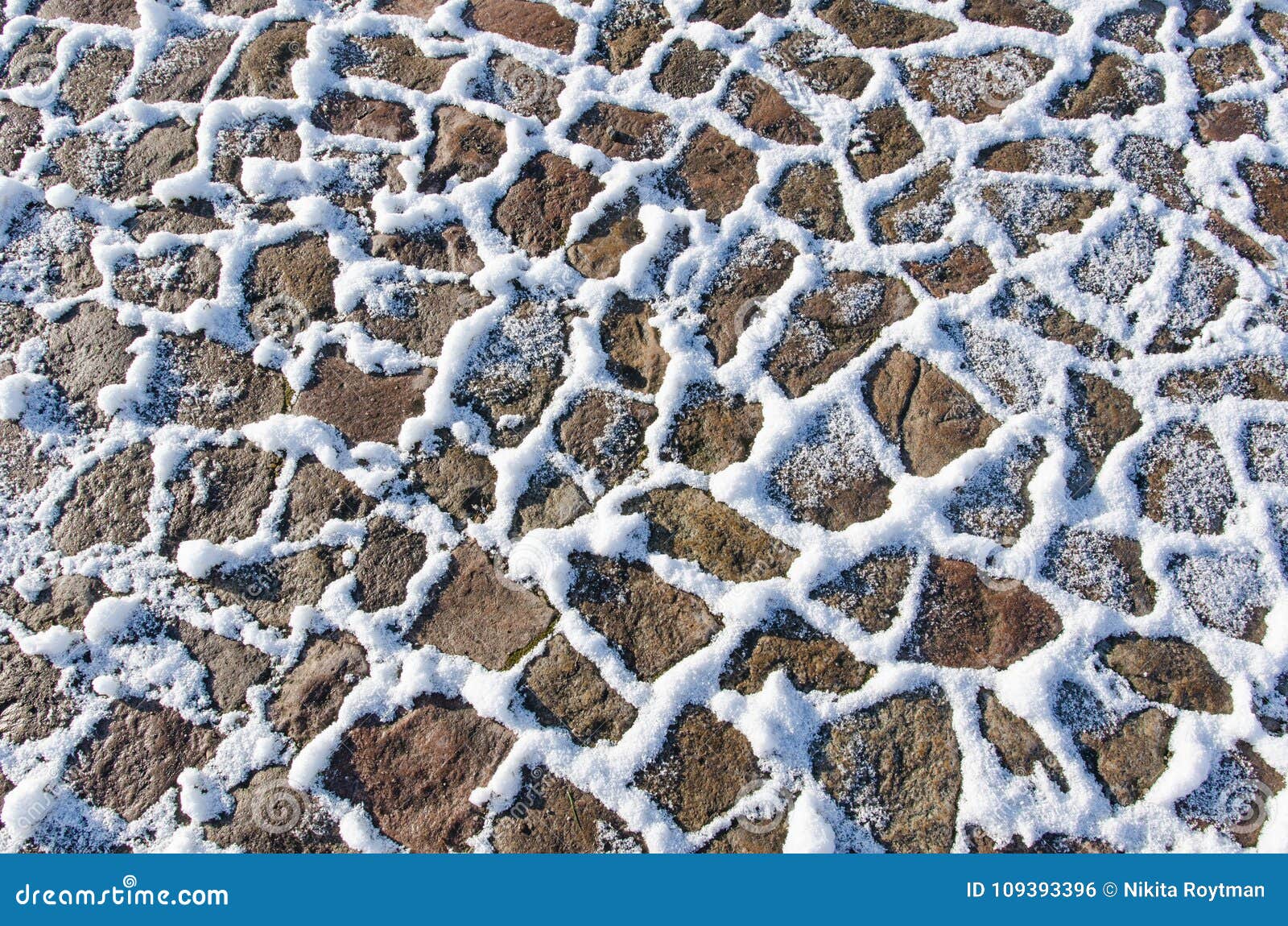 Snow pattern on the ground stock photo. Image of sunny - 109393396