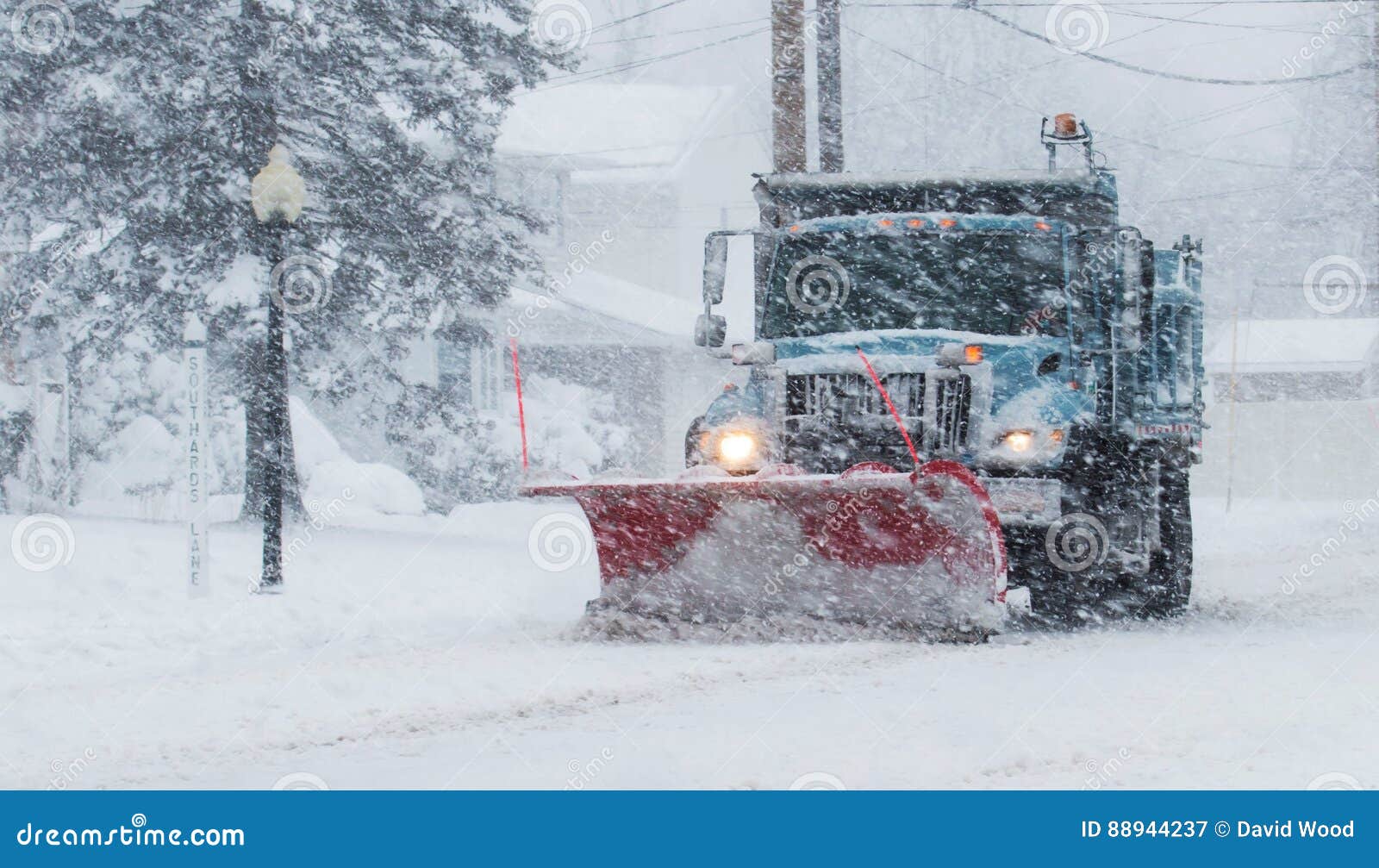 Snow Plow Working during a Blizzard Stock Image - Image of poles, storm ...