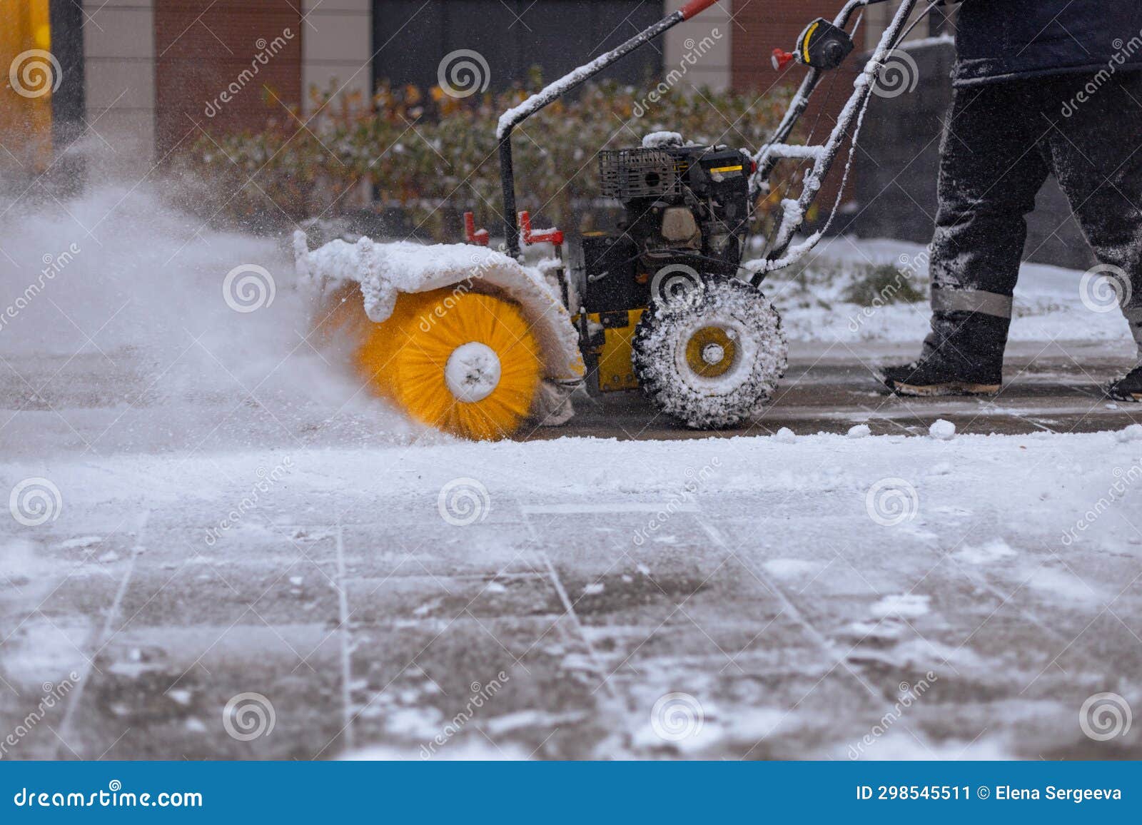 Snow Removal Work Using a Snow Blower. a Man Removes Snow Stock Image ...