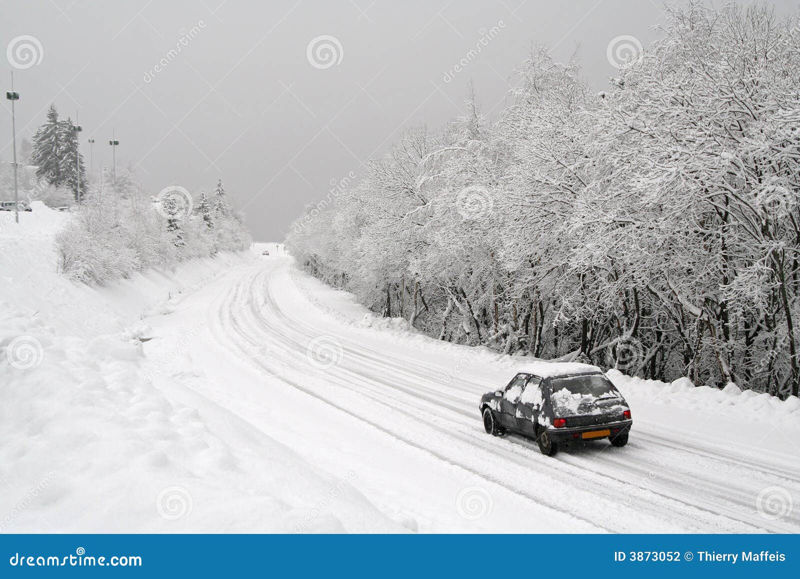 Snow on the road stock photo. Image of snowy, blizzard - 3873052