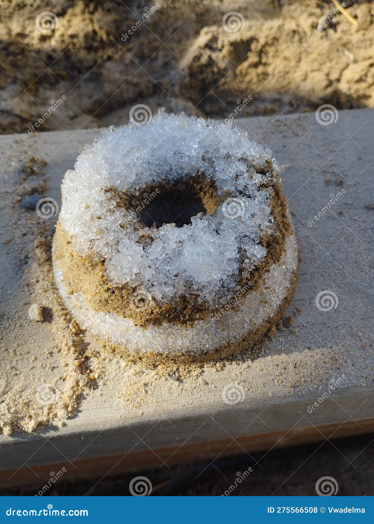 Snow and Sand Cake on the Edge of the Sandbox Stock Photo - Image of ...