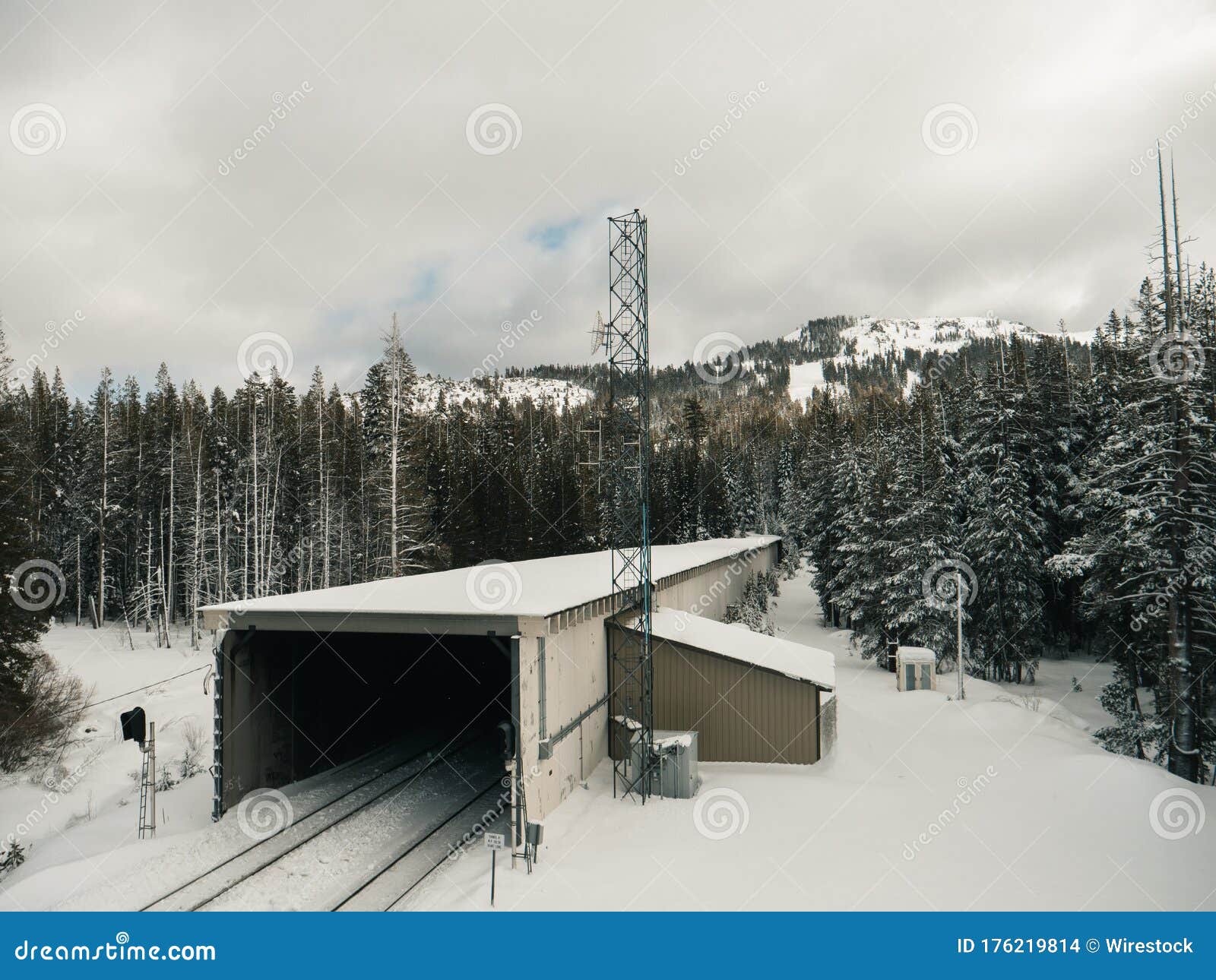 Snow Shed on Train Railway Surrounded by Alpine Trees during Winter ...