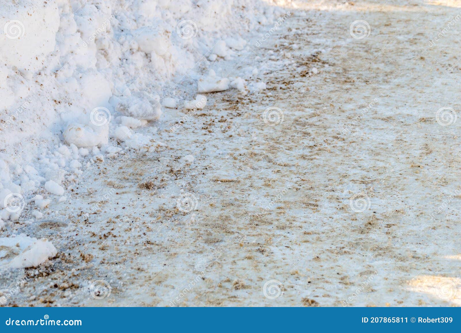 Snow on the Sidewalk Sprinkled with Salt and Sand Stock Image - Image ...