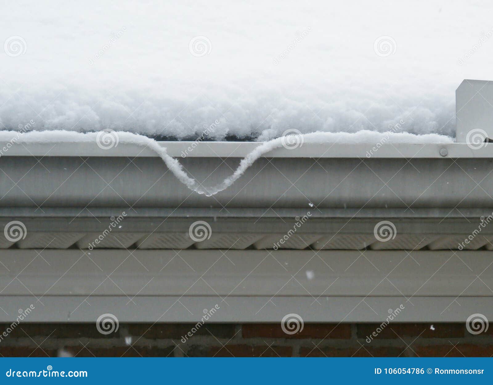 Snow filled gutter on home stock photo. Image of cold - 106054786