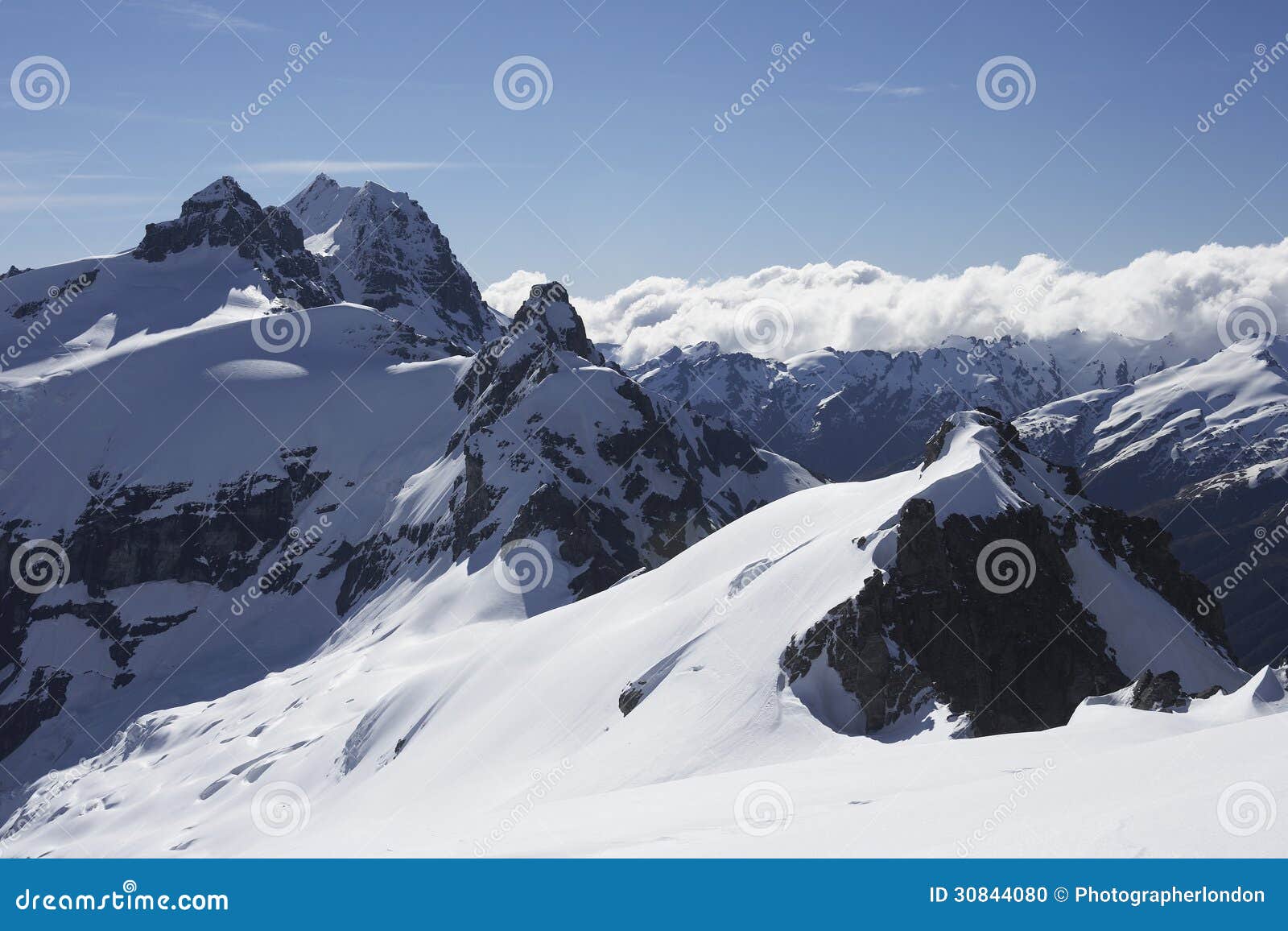 Snow-topped mountains stock photo. Image of outdoors - 30844080