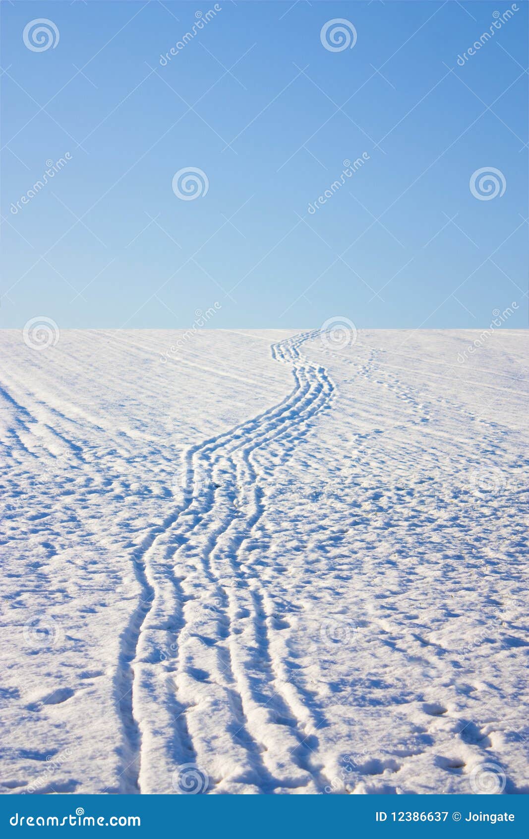 Snow tracks stock image. Image of snow, hill, blue, winter - 12386637