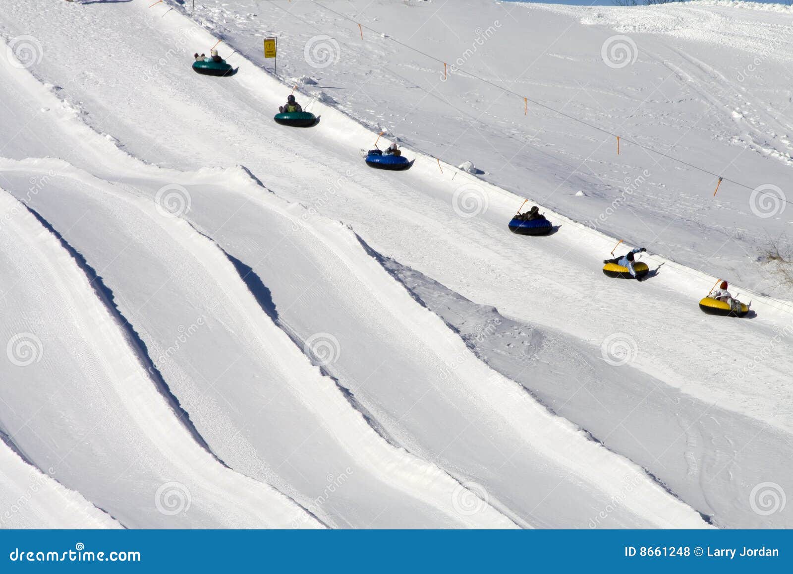 Snow tube rope lift. stock photo. Image of exciting, runs - 8661248