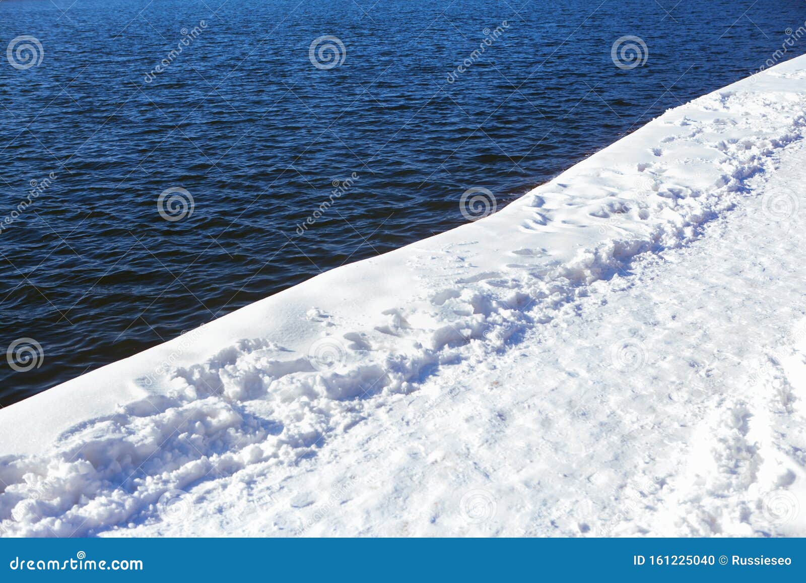 Snow and water stock photo. Image of seasonal, frost - 161225040