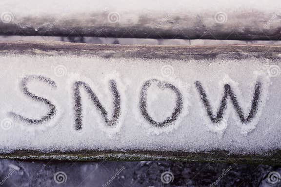 Snow written on a snow stock image. Image of backgrounds - 112105109