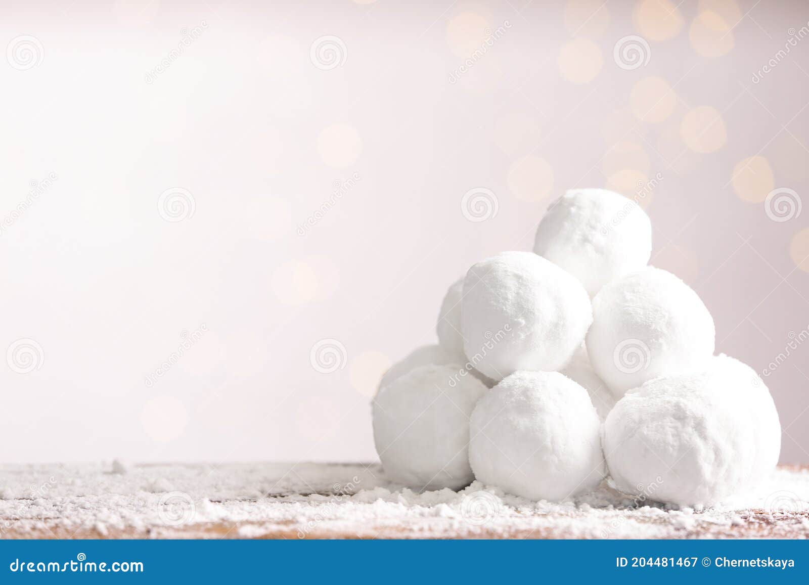 Snowballs on Table Against Blurred Lights, Space for Text Stock Image ...