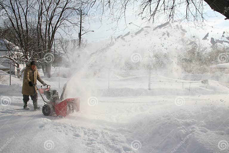 Snowblower in action stock image. Image of people, snow - 7785503