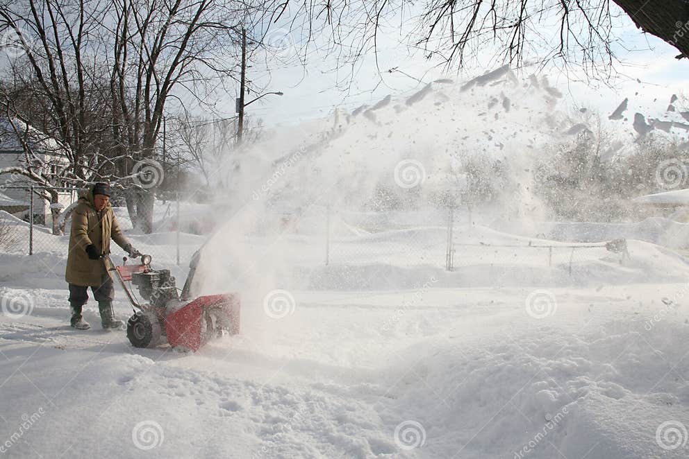 Snowblower in action stock image. Image of people, snow - 7785503