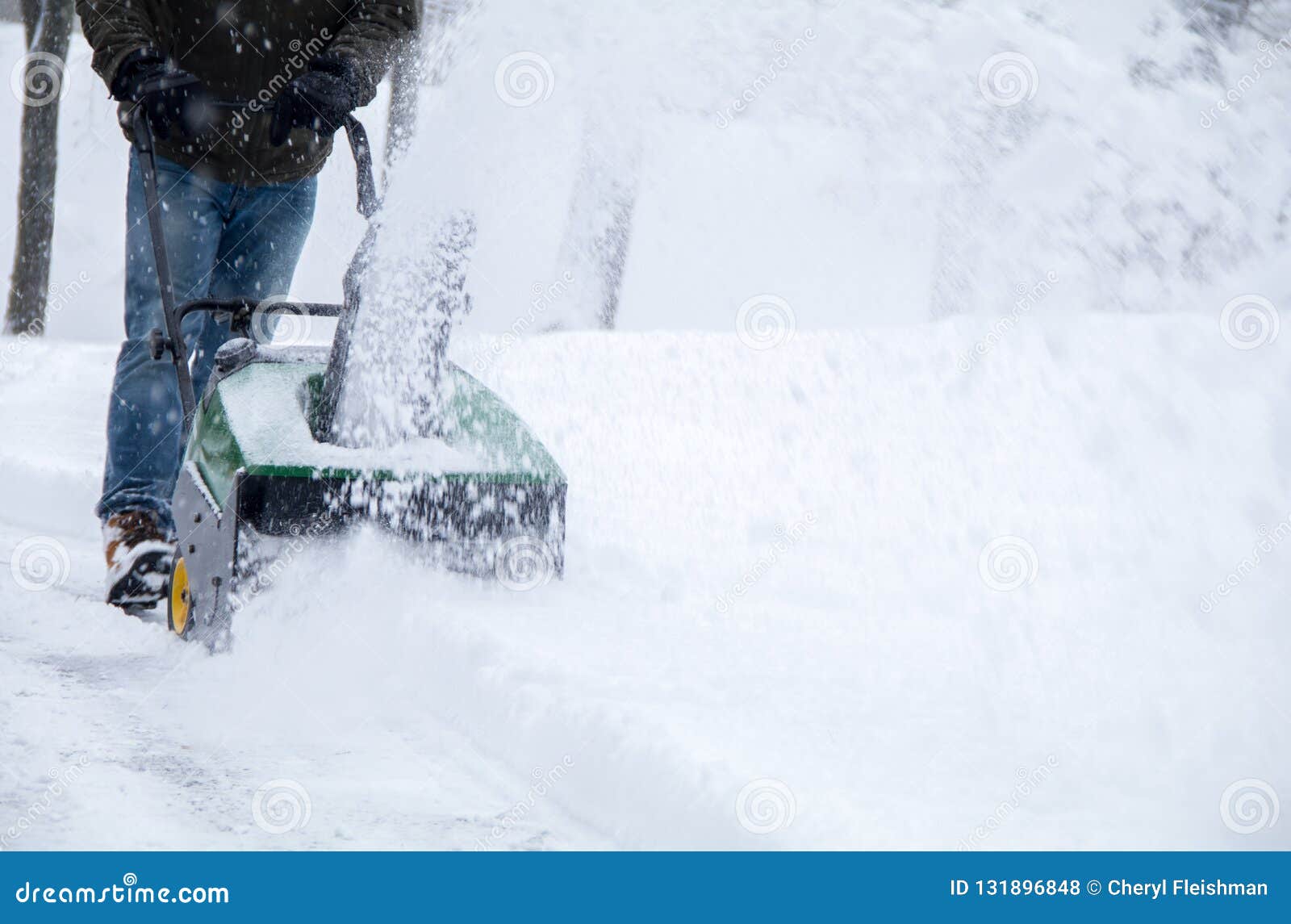 Snowblower in Action during a Snowstorm in the Blizzard Stock Photo ...