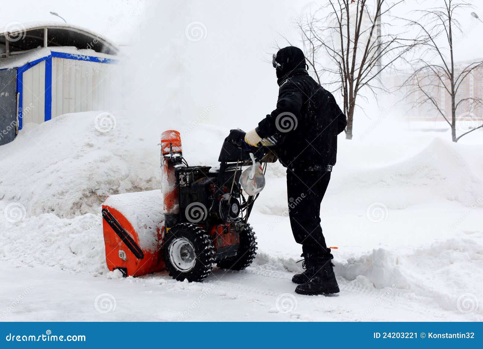 Snowblower in city stock image. Image of male, walk, plow - 24203221