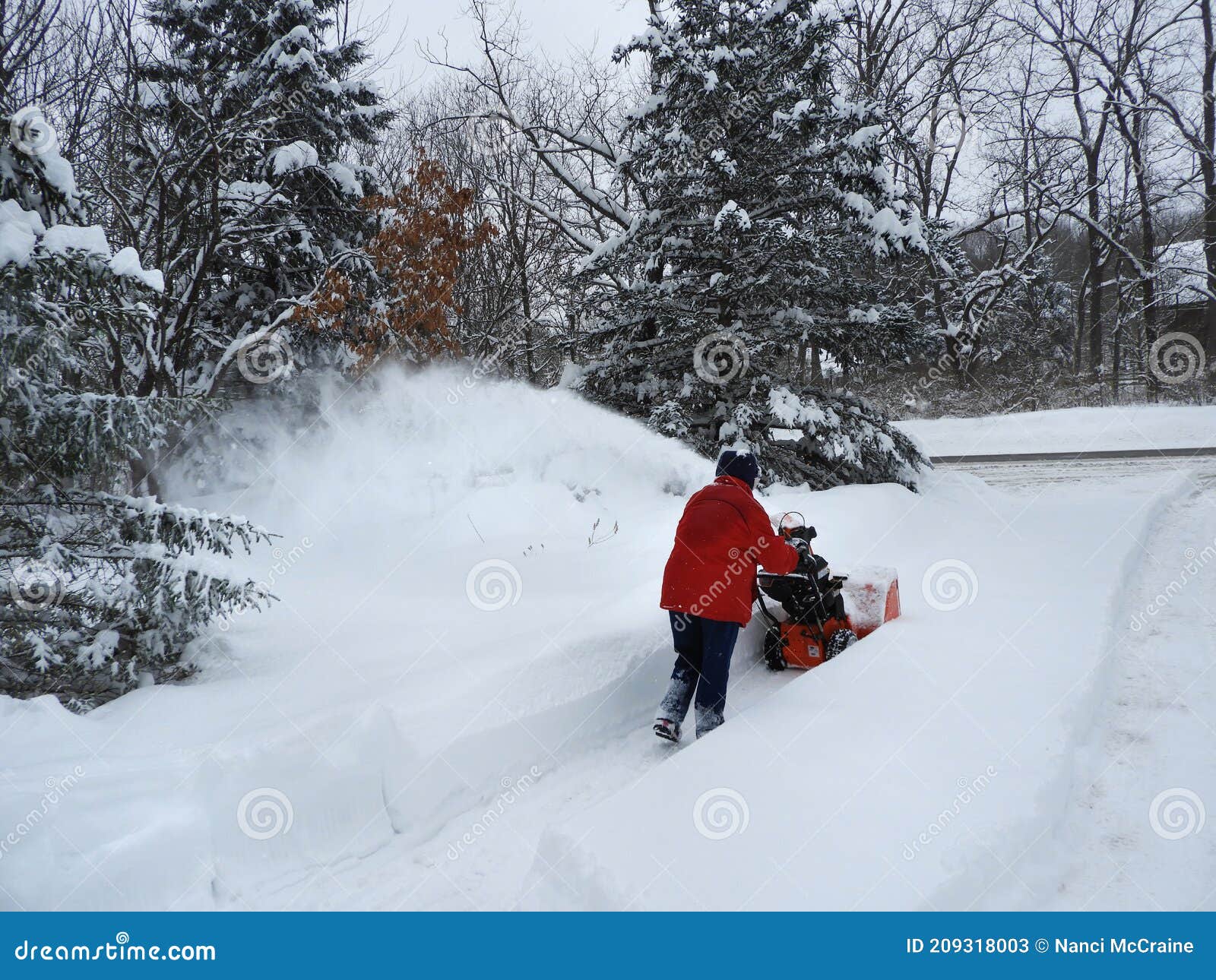 Snow Blowing Driveway after a nor`easter Snowstorm Stock Image - Image ...