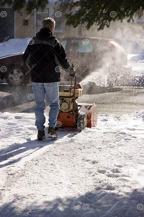 Snowblowing the Driveway stock image. Image of storm, cold - 8041777