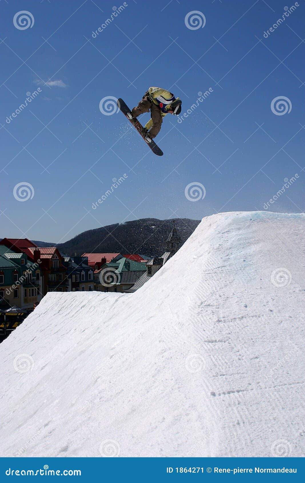 Snowboard jump on blue sky stock image. Image of yellow - 1864271