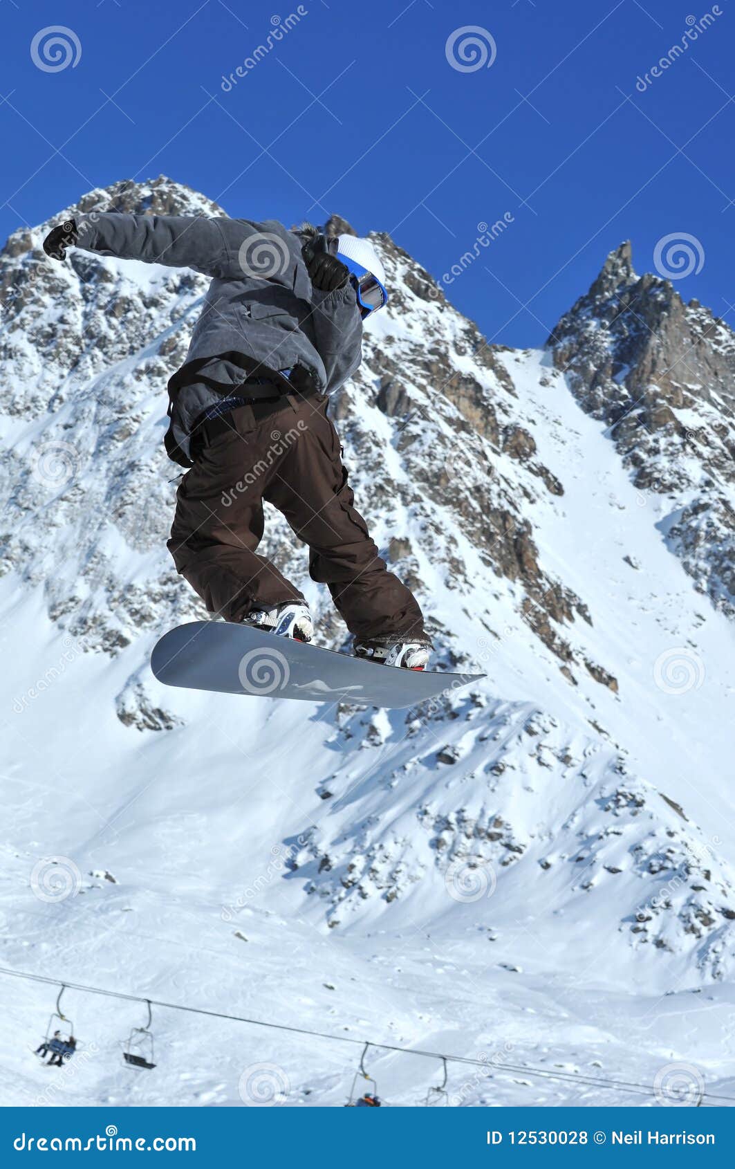 Snowboard jump and twist stock photo. Image of freerider - 12530028