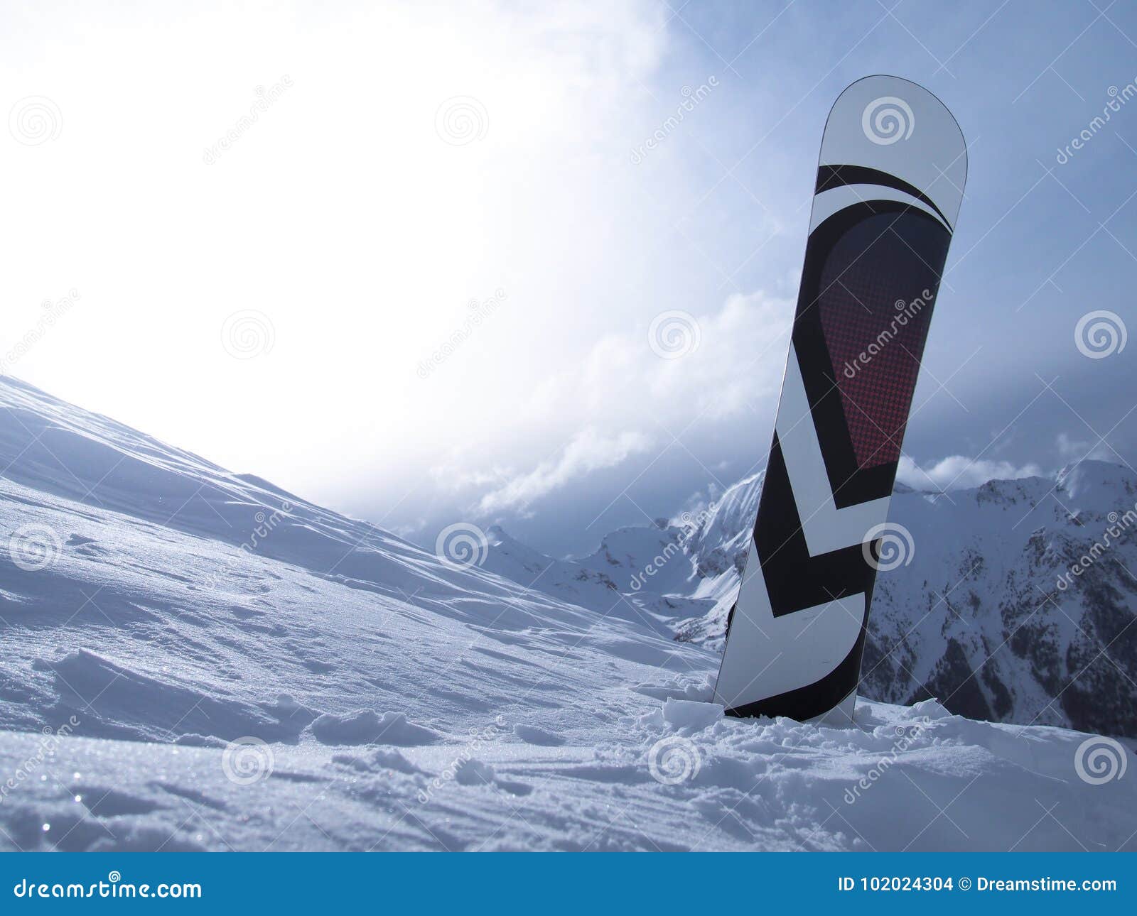 Snowboard in snow stock photo. Image of active, snowboarding - 102024304