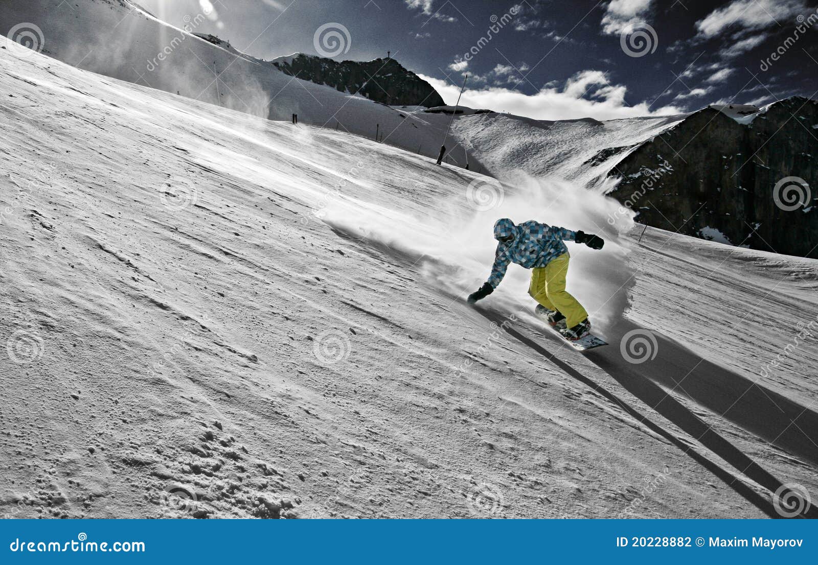 Snowboarder in a Carved Turn Stock Photo - Image of snowboarder ...