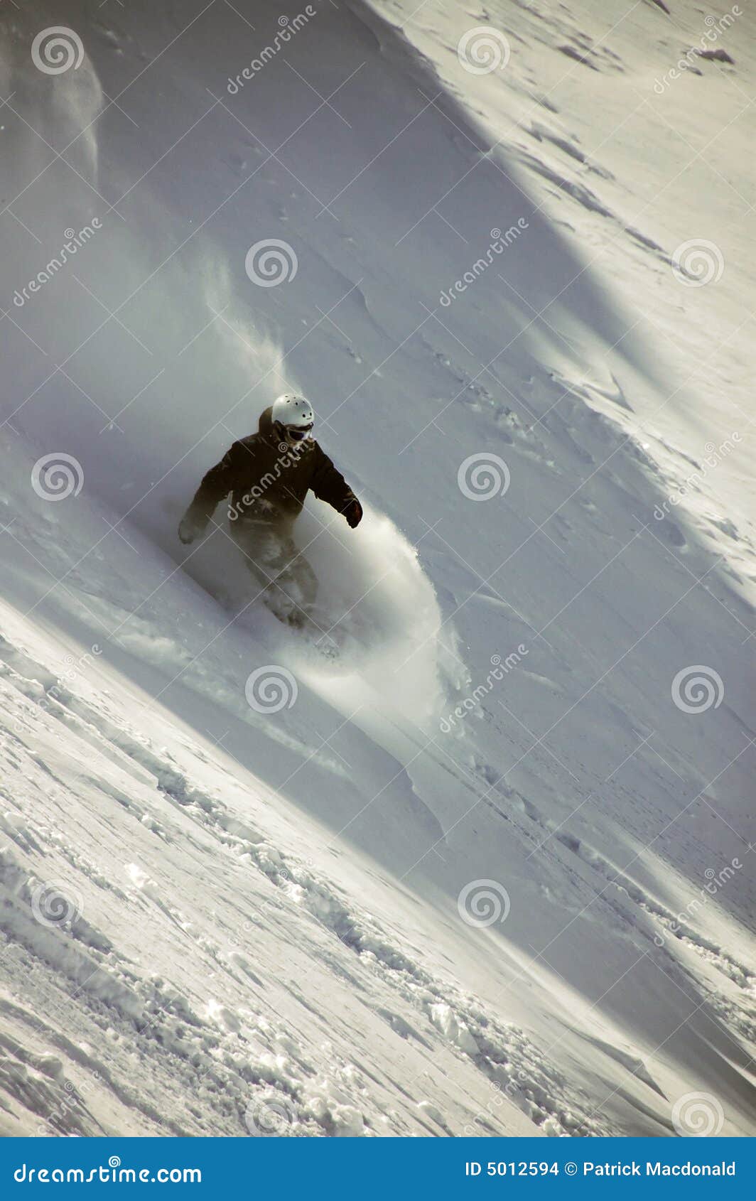 Snowboarder in deep powder stock photo. Image of snow - 5012594