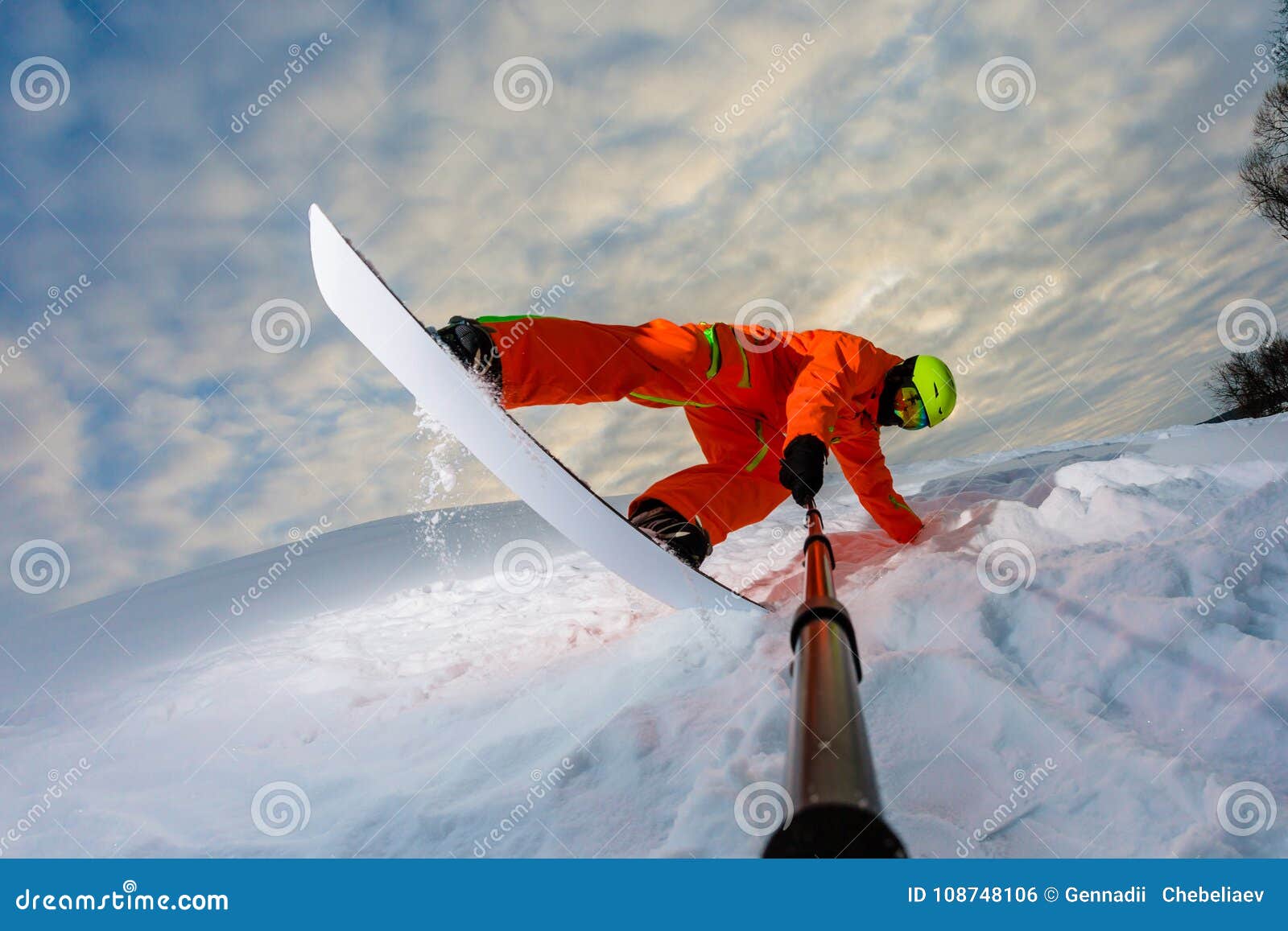 Snowboarder Doing a Trick and Making a Selfie Stock Photo - Image of ...