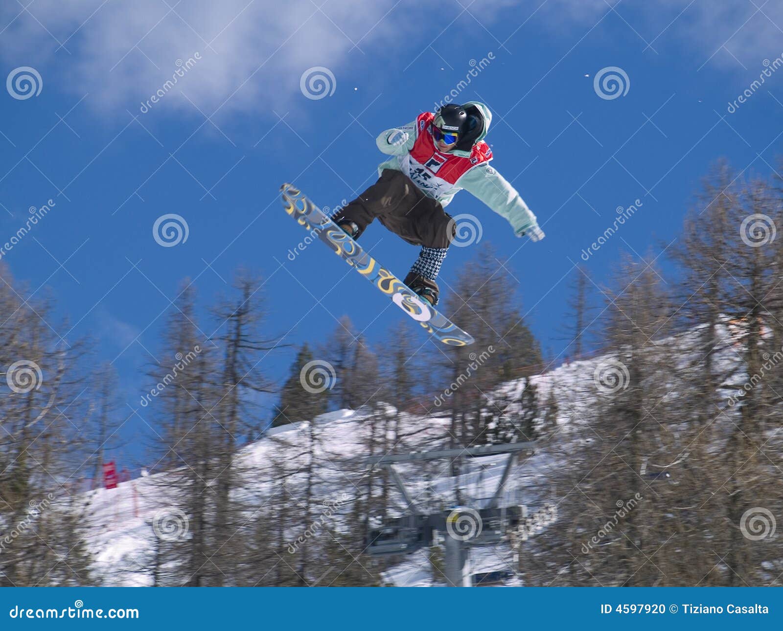 Snowboarder jumping editorial image. Image of blue, trees - 4597920