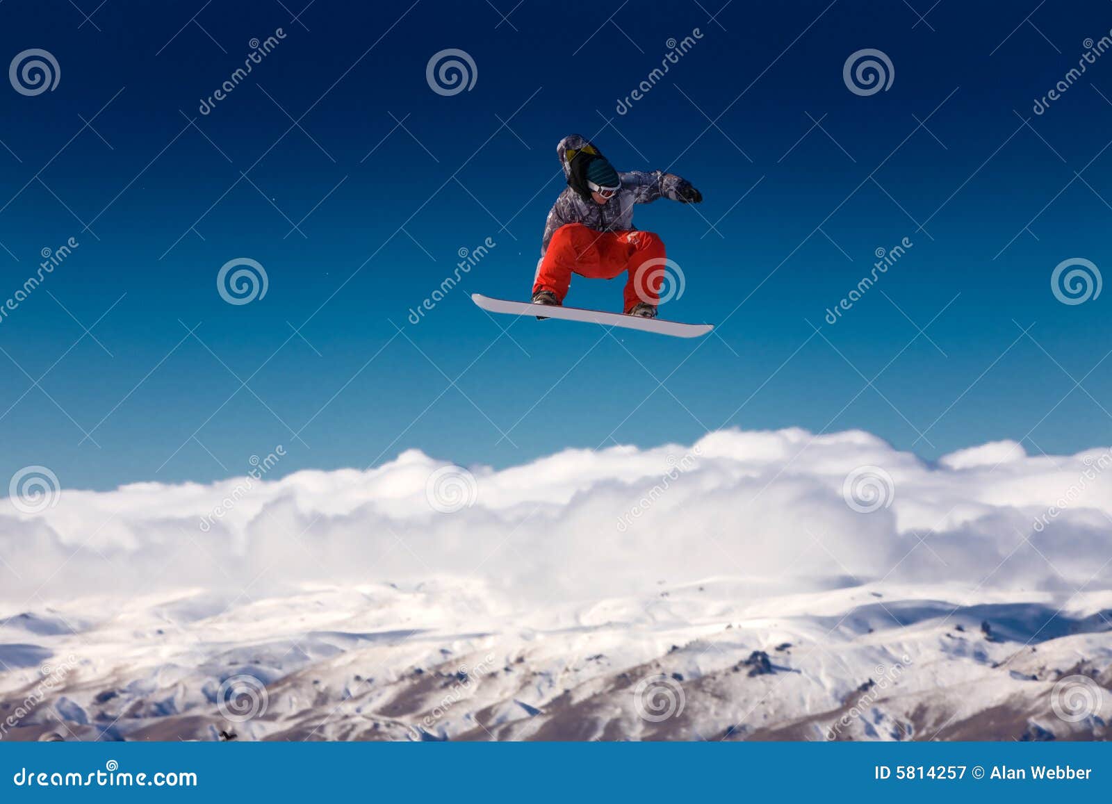 Snowboarder jumping in air stock image. Image of ride - 5814257