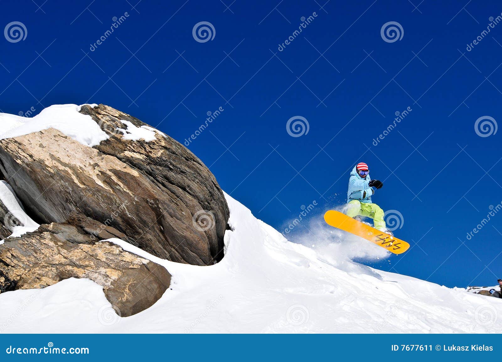Snowboarder Jumping of Cliff at Fresh Snow Stock Image - Image of ...
