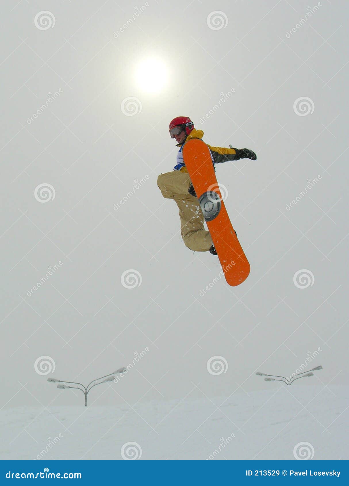 Snowboarder Jumping and Sun Stock Image - Image of freeze, skier: 213529