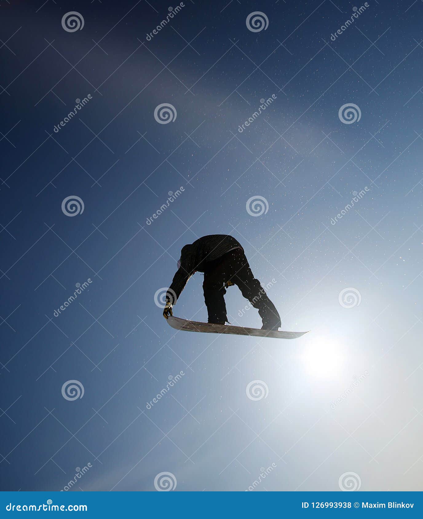 Snowboarder in sky stock photo. Image of beautiful, blue - 126993938
