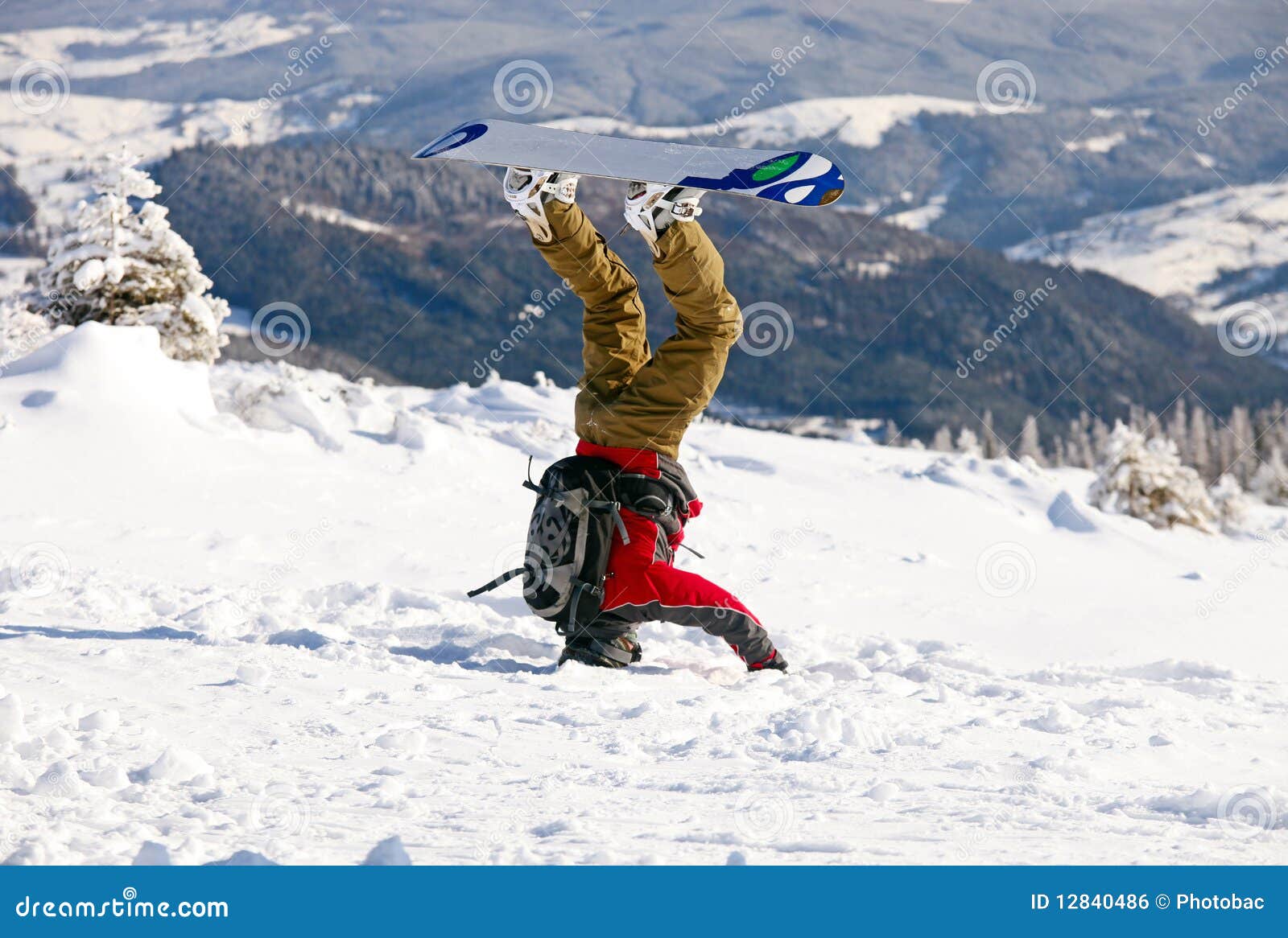 Snowboarder Standing on His Head in Snow Stock Photo - Image of snow ...