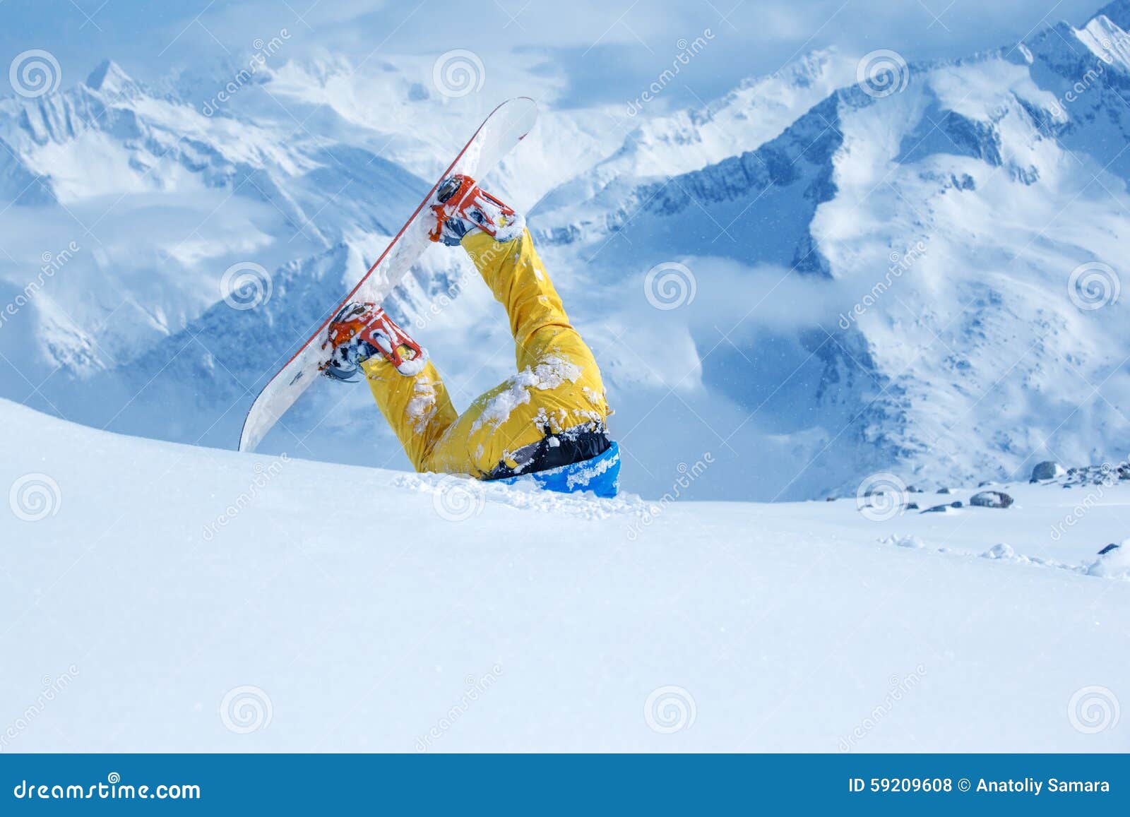 Snowboarder stuck in snow stock photo. Image of active - 59209608