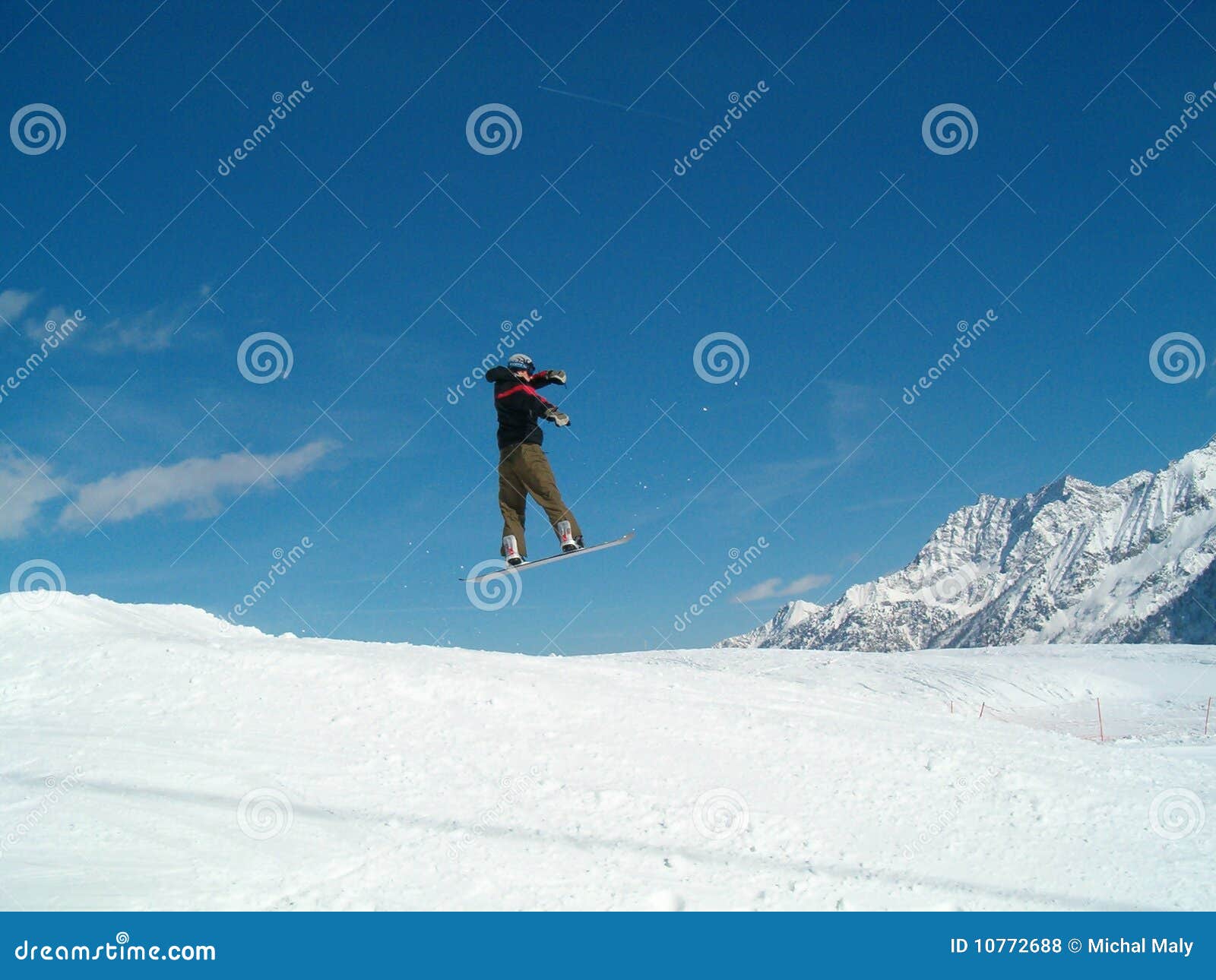 Snowborder jumping stock photo. Image of enjoying, mountain - 10772688