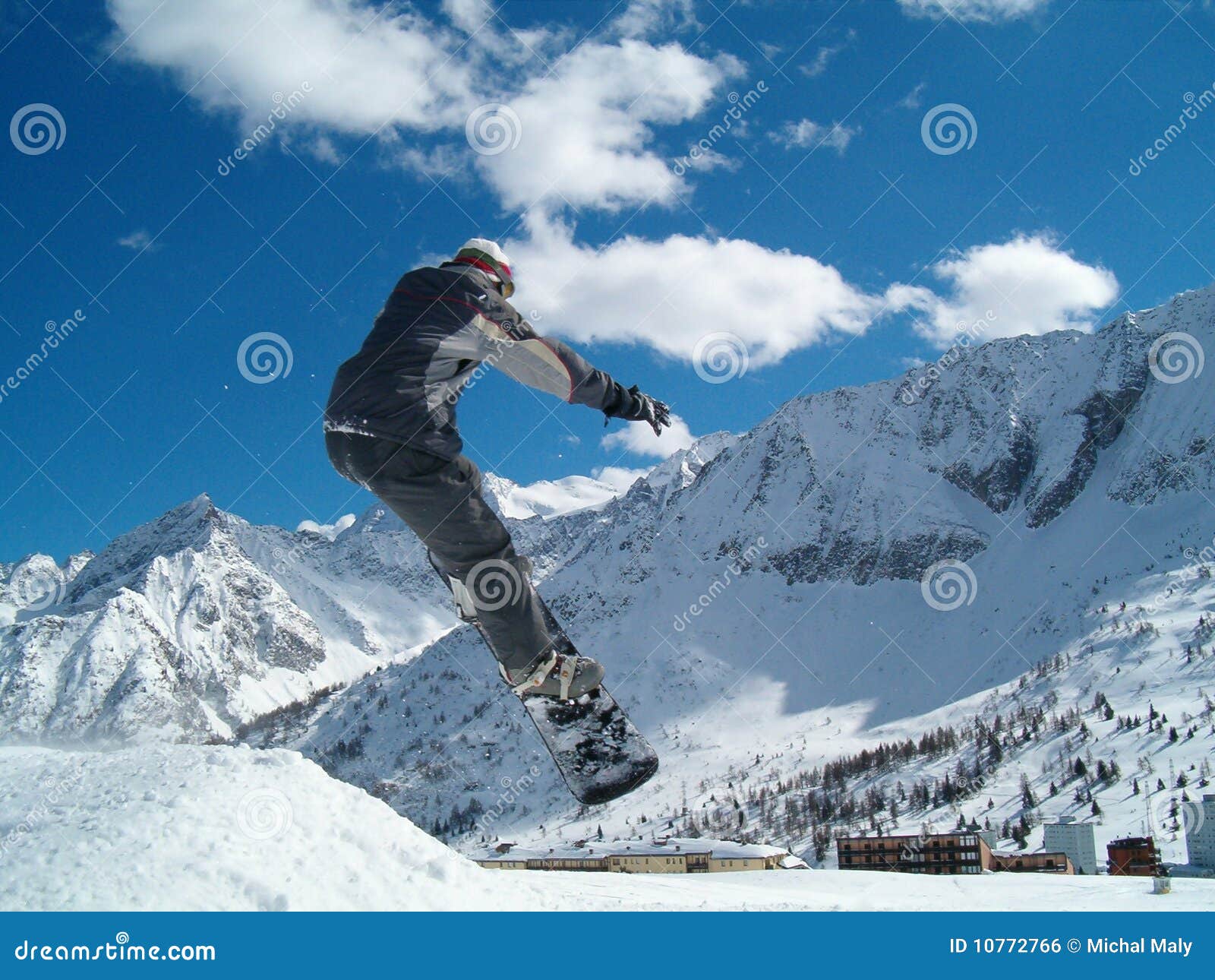 Snowborder jumping stock photo. Image of blue, boards - 10772766