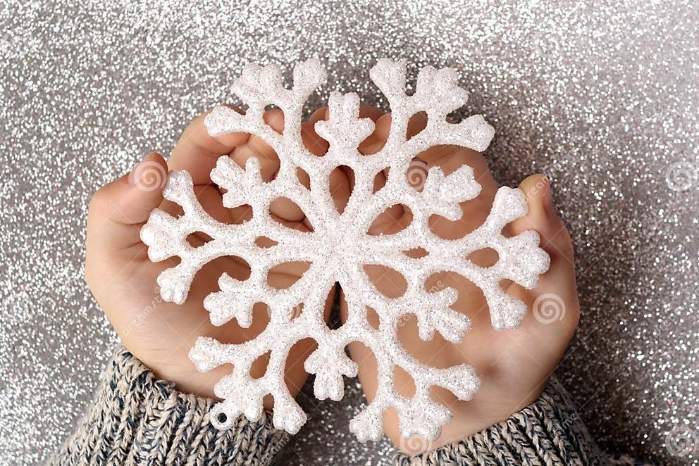 Snowflake in hands stock photo. Image of holiday, decoration - 101254580