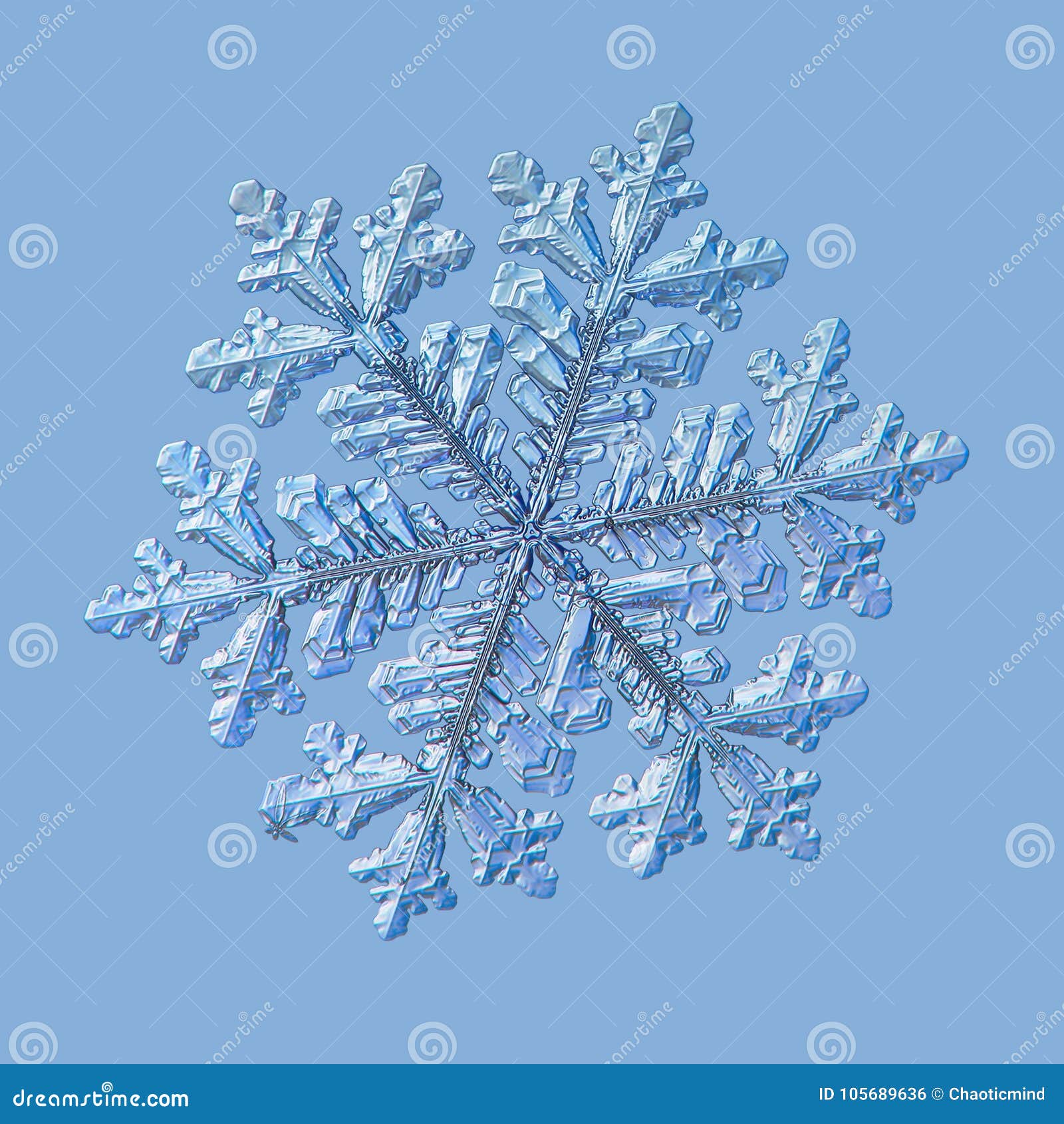 Real Snowflake Isolated on Uniform Blue Background Stock Photo - Image ...