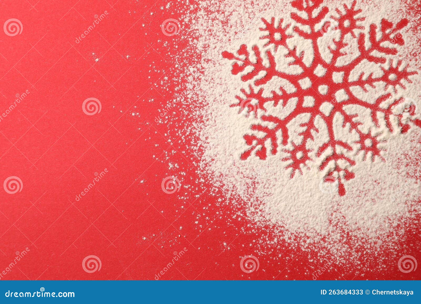 Snowflake Silhouette Made with Artificial Snow on Red Background, Top ...
