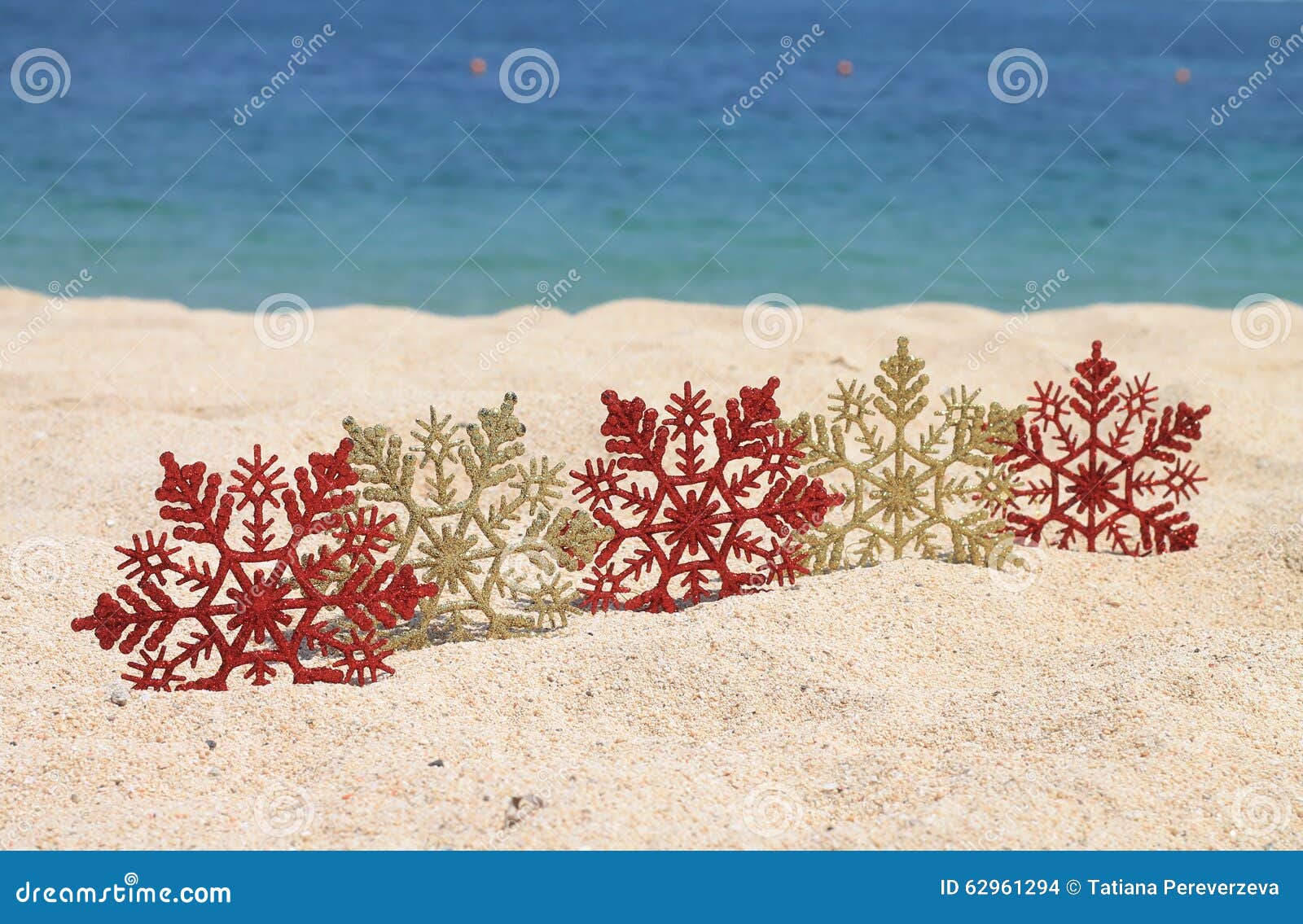 Snowflakes on the sand stock photo. Image of sunshiny - 62961294