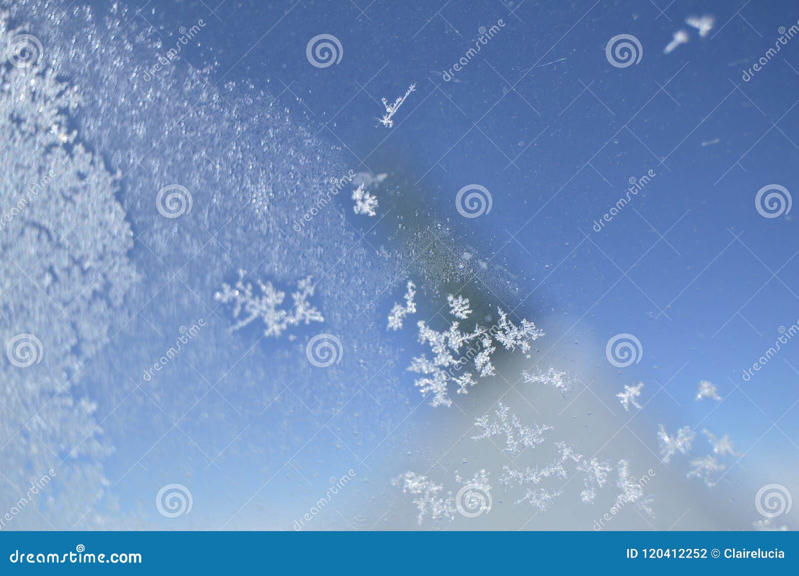 Snowflakes on the Window of the Plane. in the Background, through the ...