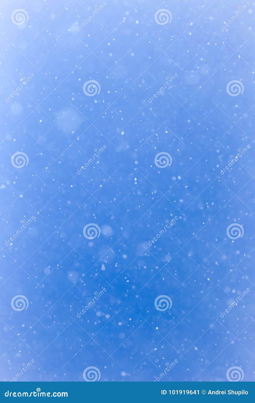 Snowing on a blue sky stock image. Image of flakes, slope - 101919641