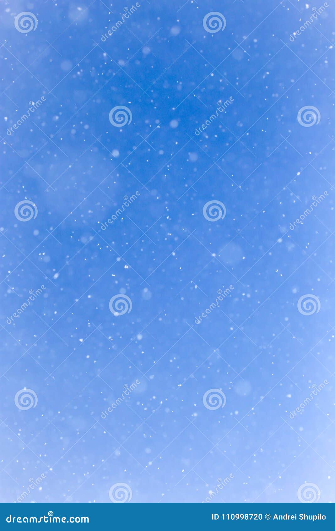 Snowing on a blue sky stock photo. Image of frost, cloud - 110998720