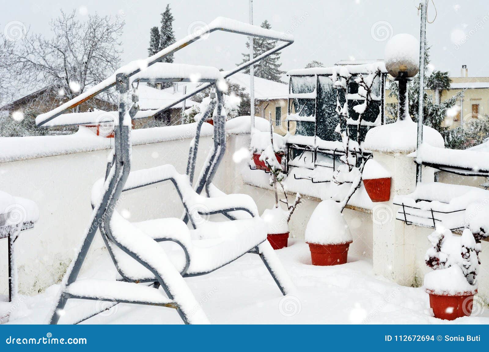 Snowing on the garden stock photo. Image of frozen, weather - 112672694