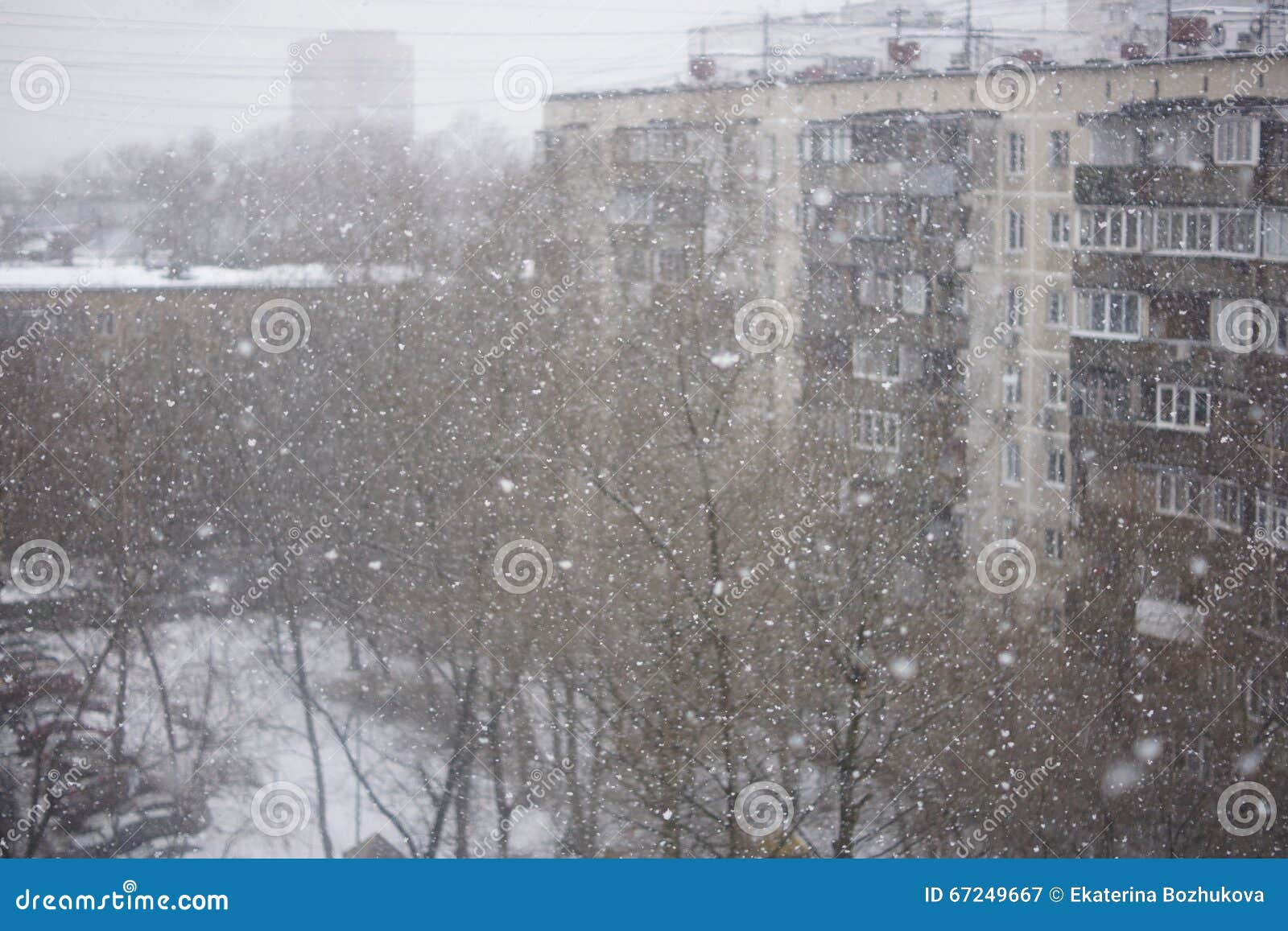 It is Snowing Outside the Window on the Background of the City. Stock ...