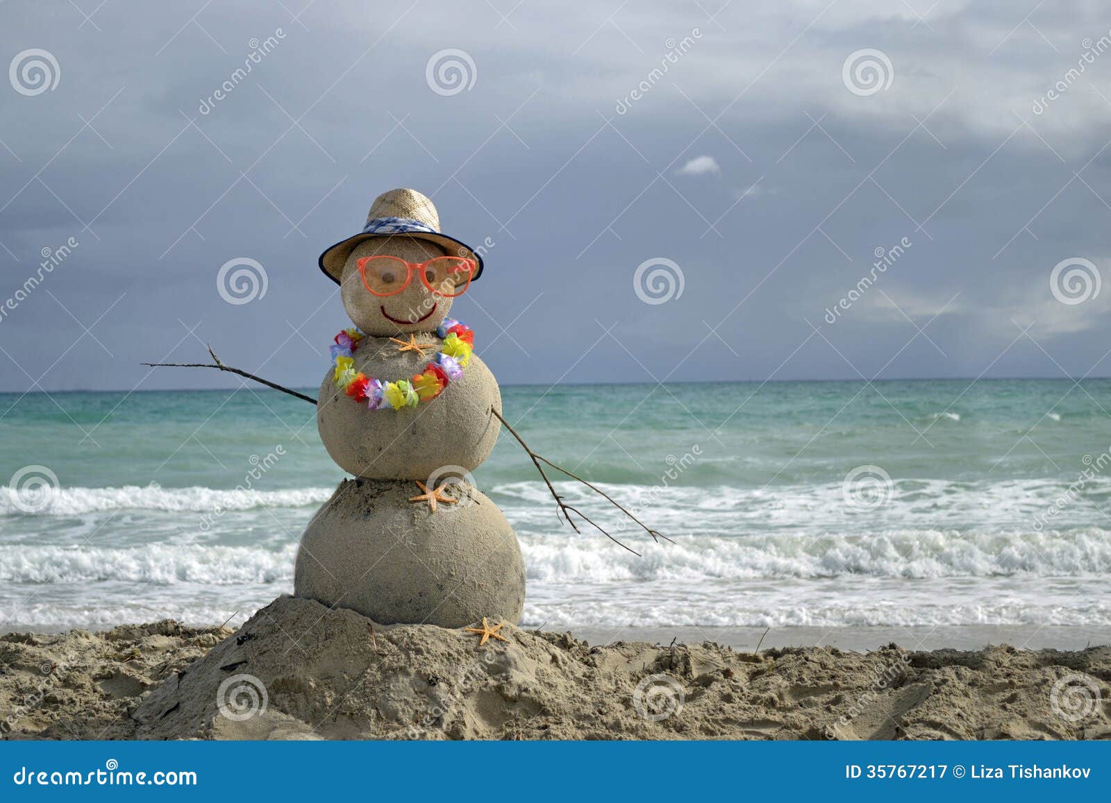 Snowman on beach stock image. Image of leisure, clouds - 35767217